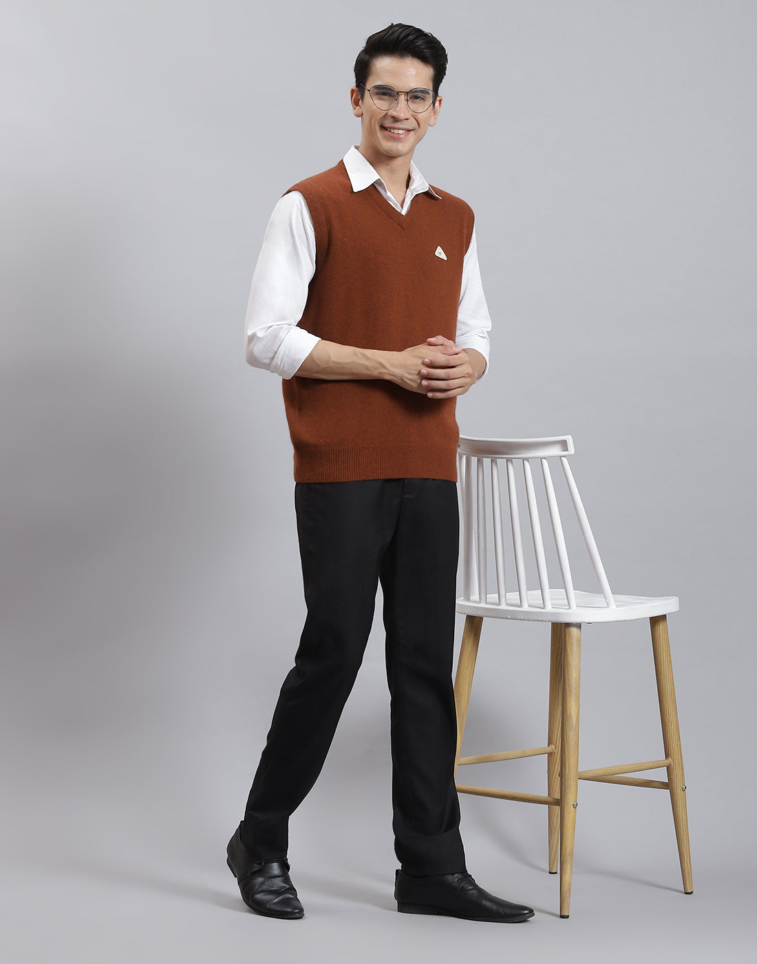 Buy Men Rust Solid V Neck Sleeveless Sweater Online in India - Monte Carlo