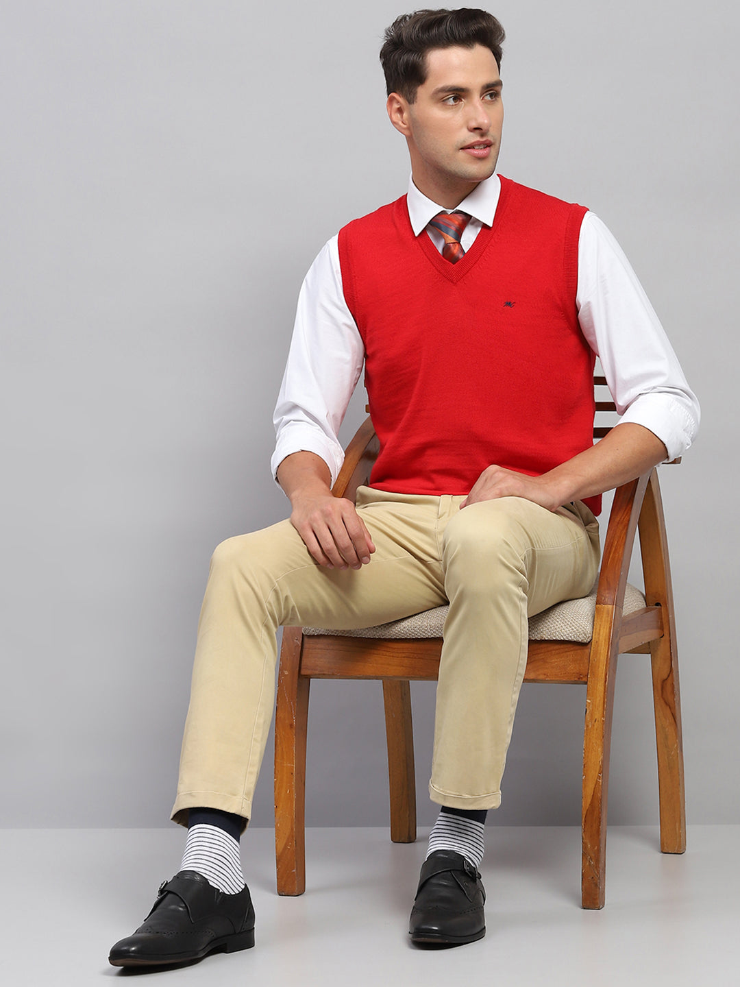 Buy Men Red Solid V Neck Sleeveless Sweater Online in India - Monte Carlo