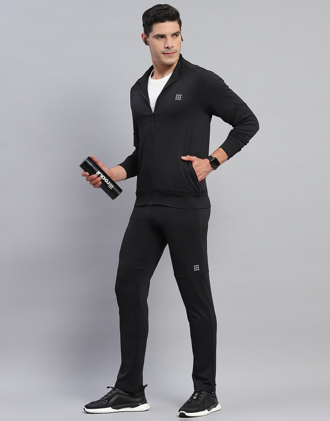 Buy Men Black Solid Round Neck Full Sleeve Tracksuit Online in India ...