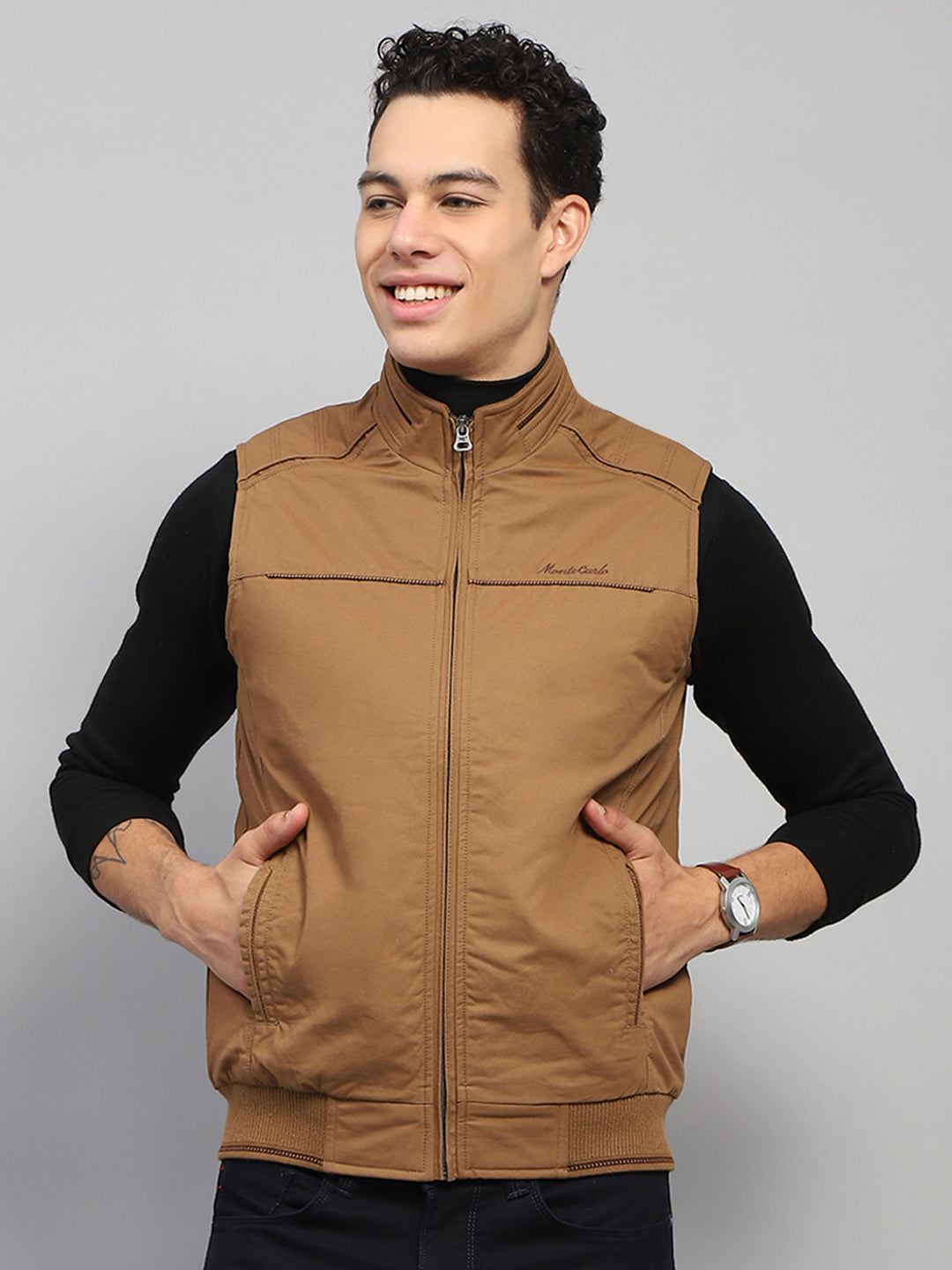 Buy Men Brown Solid Mock Neck Sleeveless Jacket Online in India - Monte ...