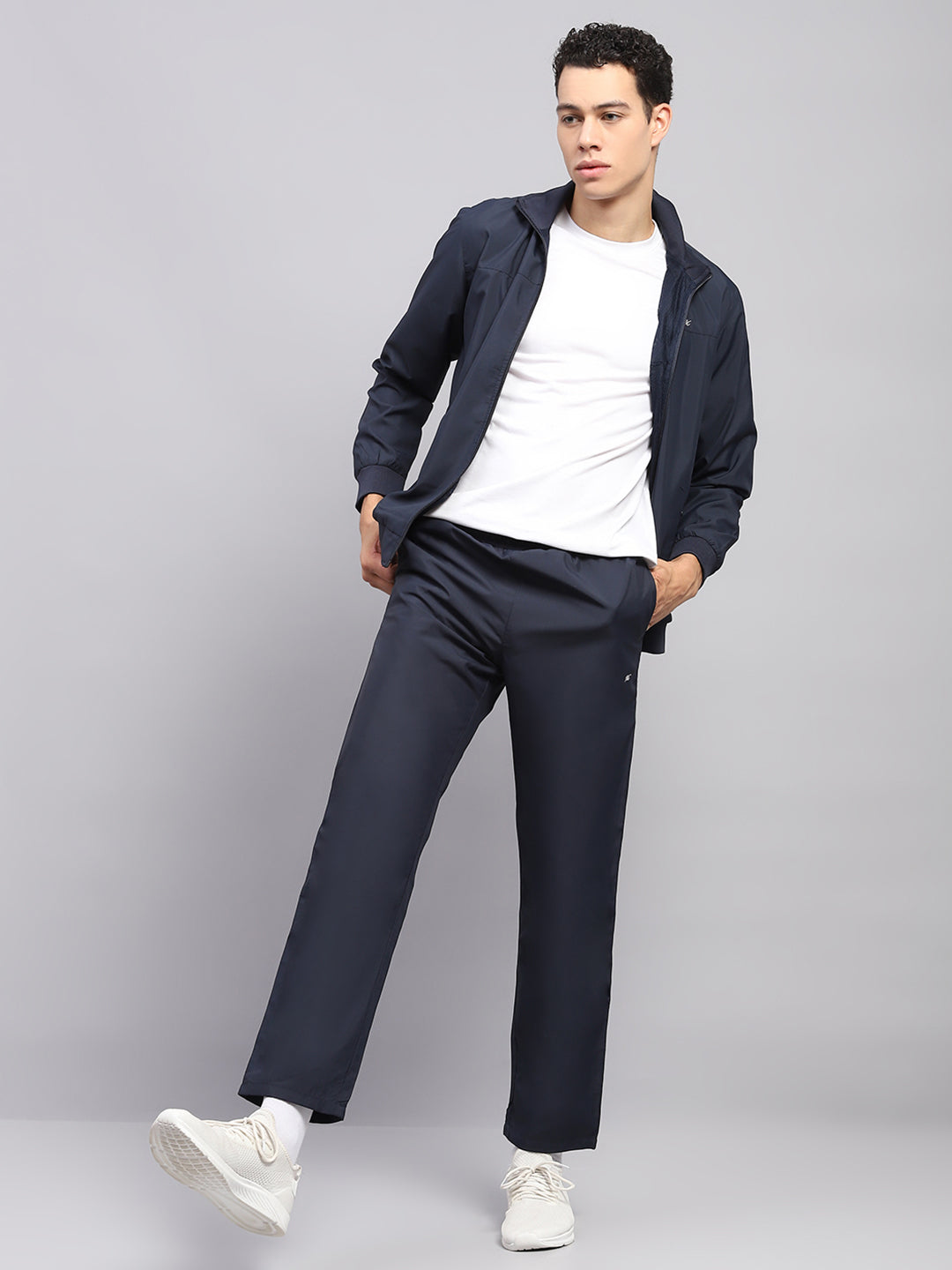 Buy Men Blue Solid High Neck Full Sleeve Tracksuit Online in India ...
