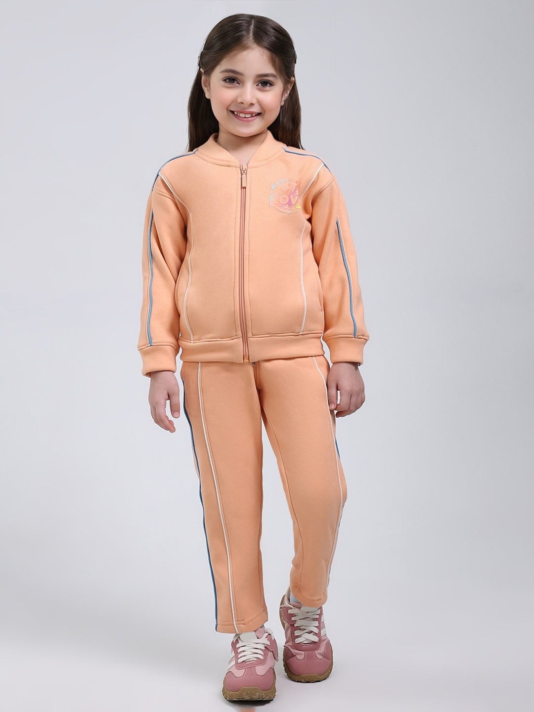 Buy Girls Peach Printed Mock Neck Full Sleeve Tracksuit Online in India ...