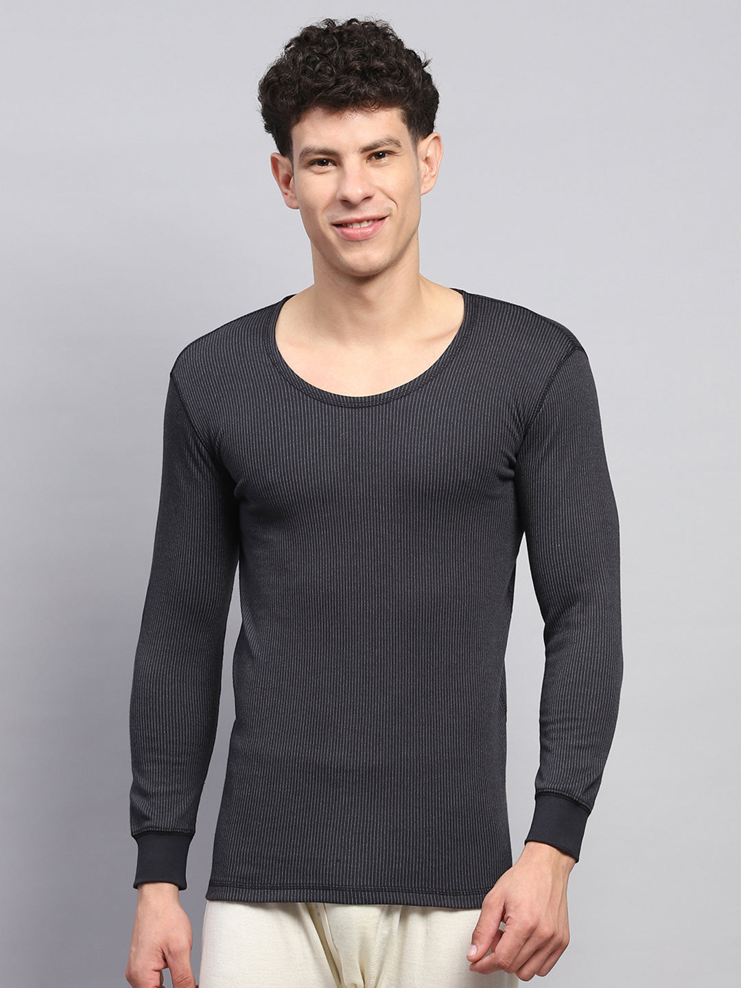 Buy Men Black Solid Round Neck Full Sleeve Thermal Vest Online in India ...