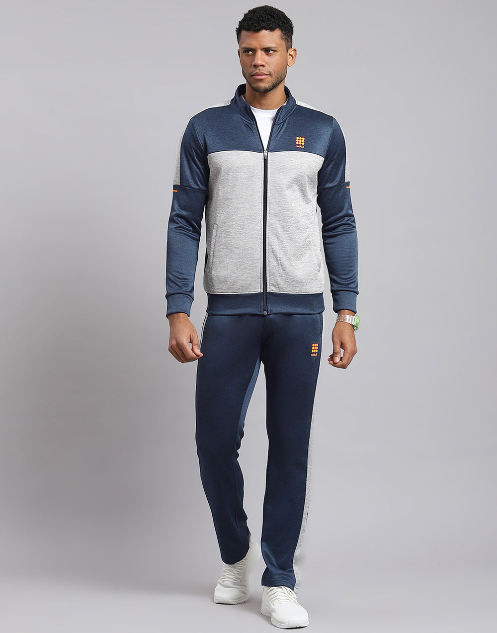 Buy Men Navy Blue Solid Stand Collar Full Sleeve Tracksuit Online in ...