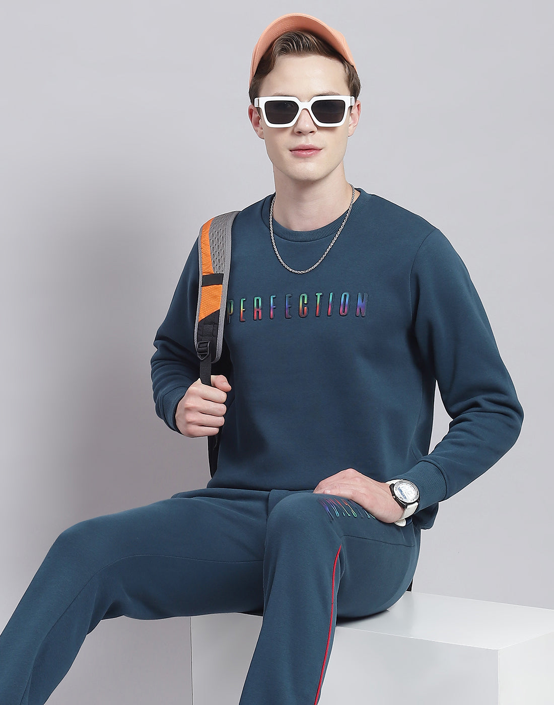 Buy Men Teal Blue Solid Round Neck Full Sleeve Tracksuit Online in ...