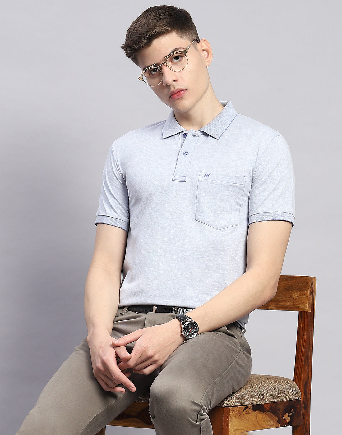 Buy Men Blue Solid Polo Collar Half Sleeve T-Shirt Online in India ...